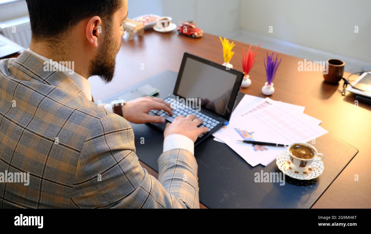 business person works with computer on the office desk Stock Photo - Alamy