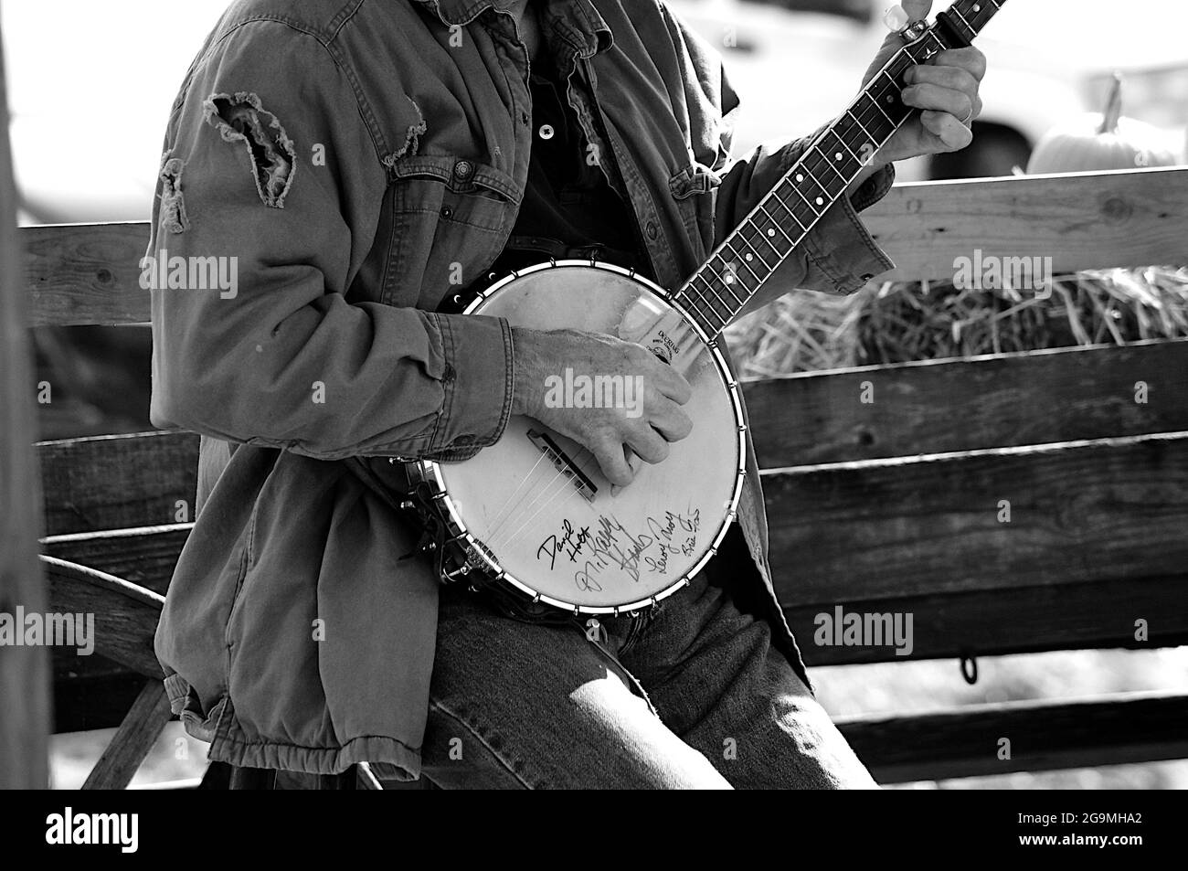 Banjo Player on bench Stock Photo - Alamy