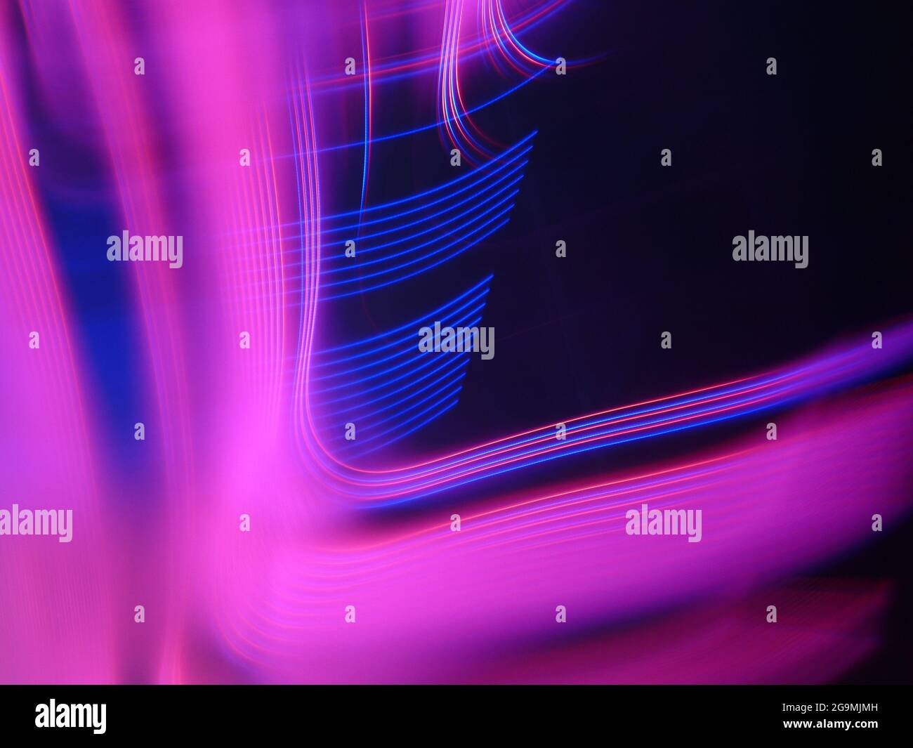 Rendering of purple and blue high-tech light trails Stock Photo - Alamy