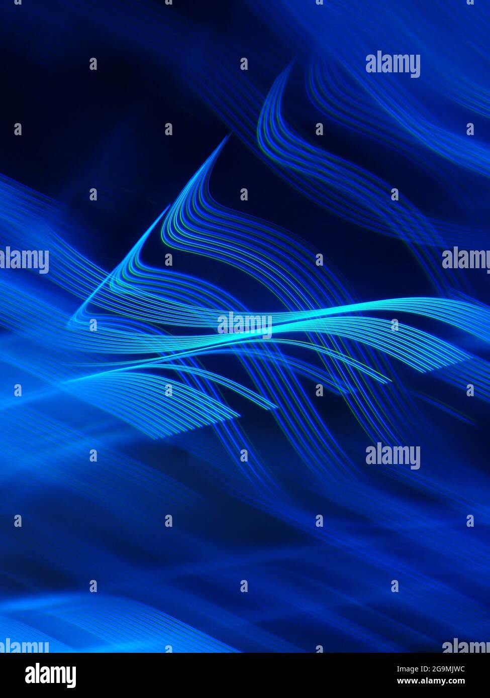 Rendering of blue high-tech light trails Stock Photo - Alamy
