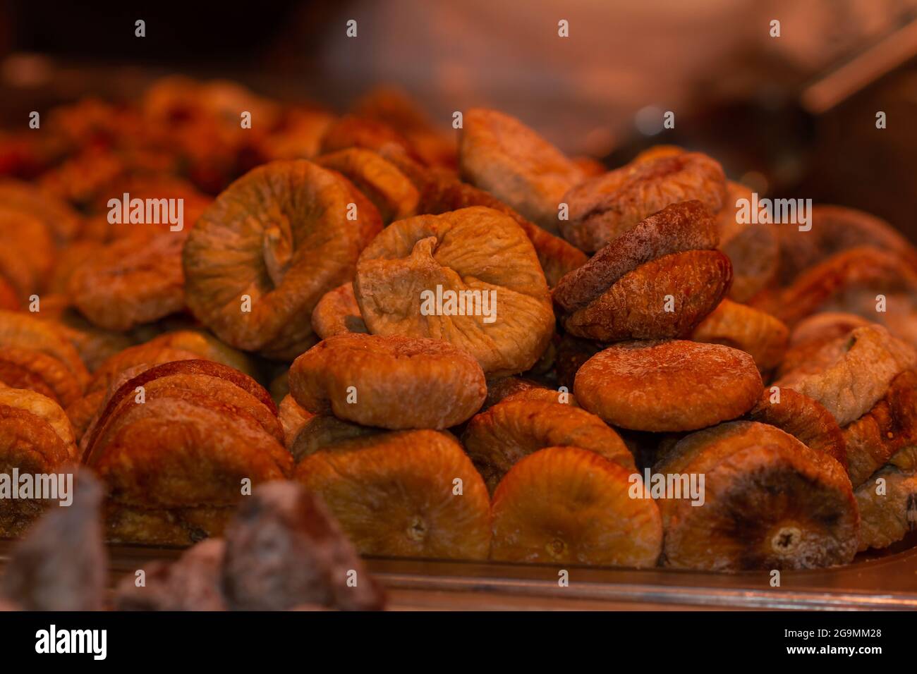 Pile of dried figs in bulk ready for consumption displayed in a store ...