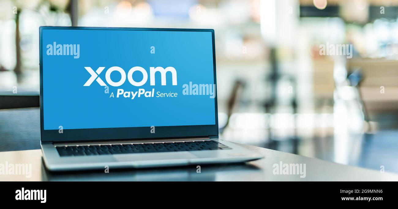 POZNAN, POL - JUN 12, 2021: Laptop computer displaying logo of Xoom, an ...
