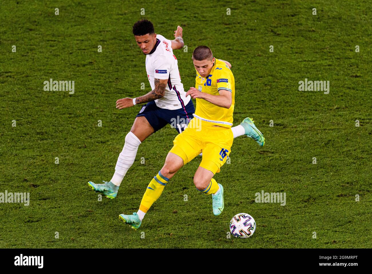 Rome, Italy - 03 July: Vitalii Mykolenko of Ukraine (R) is chased by ...