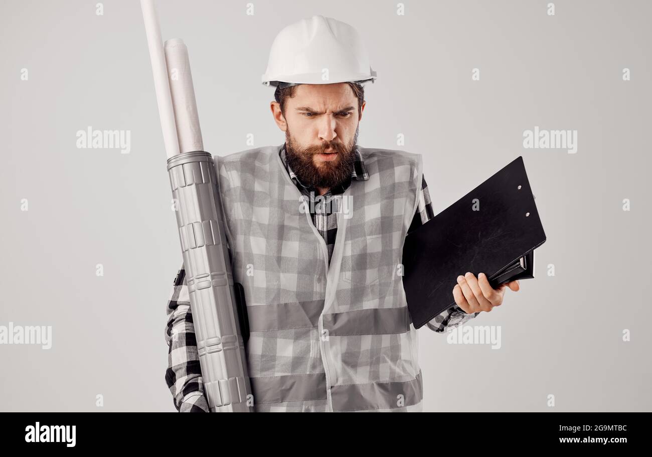 man in working form drawings documents construction Stock Photo - Alamy