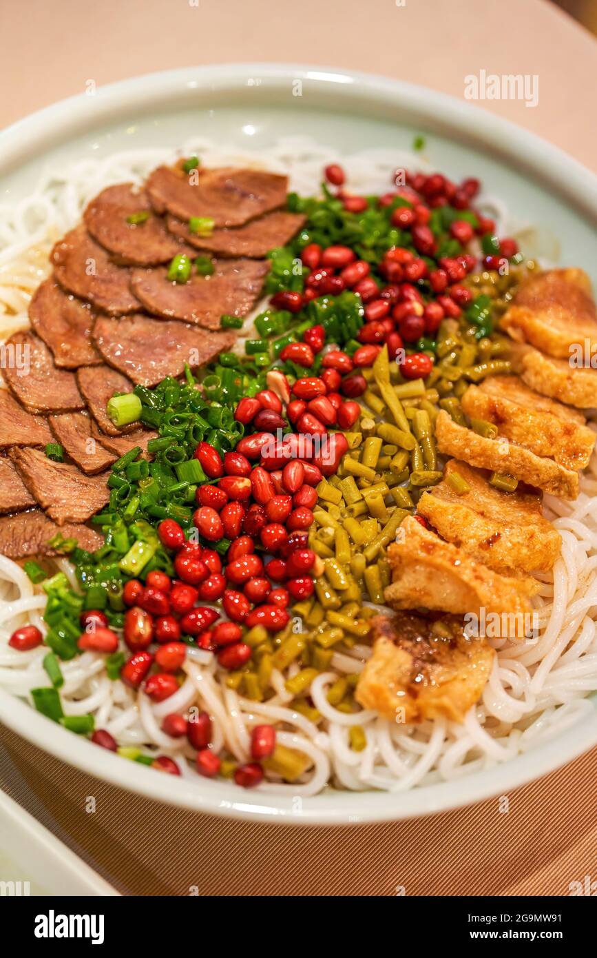 A special dish from Guangxi, China, Guilin rice noodles, cold rice ...