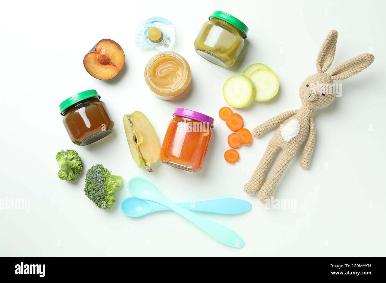 Concept of baby food on white background Stock Photo - Alamy