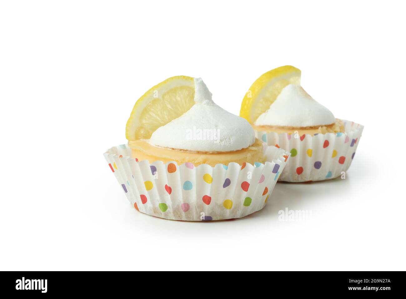 Tasty lemon cupcakes isolated on white background Stock Photo - Alamy
