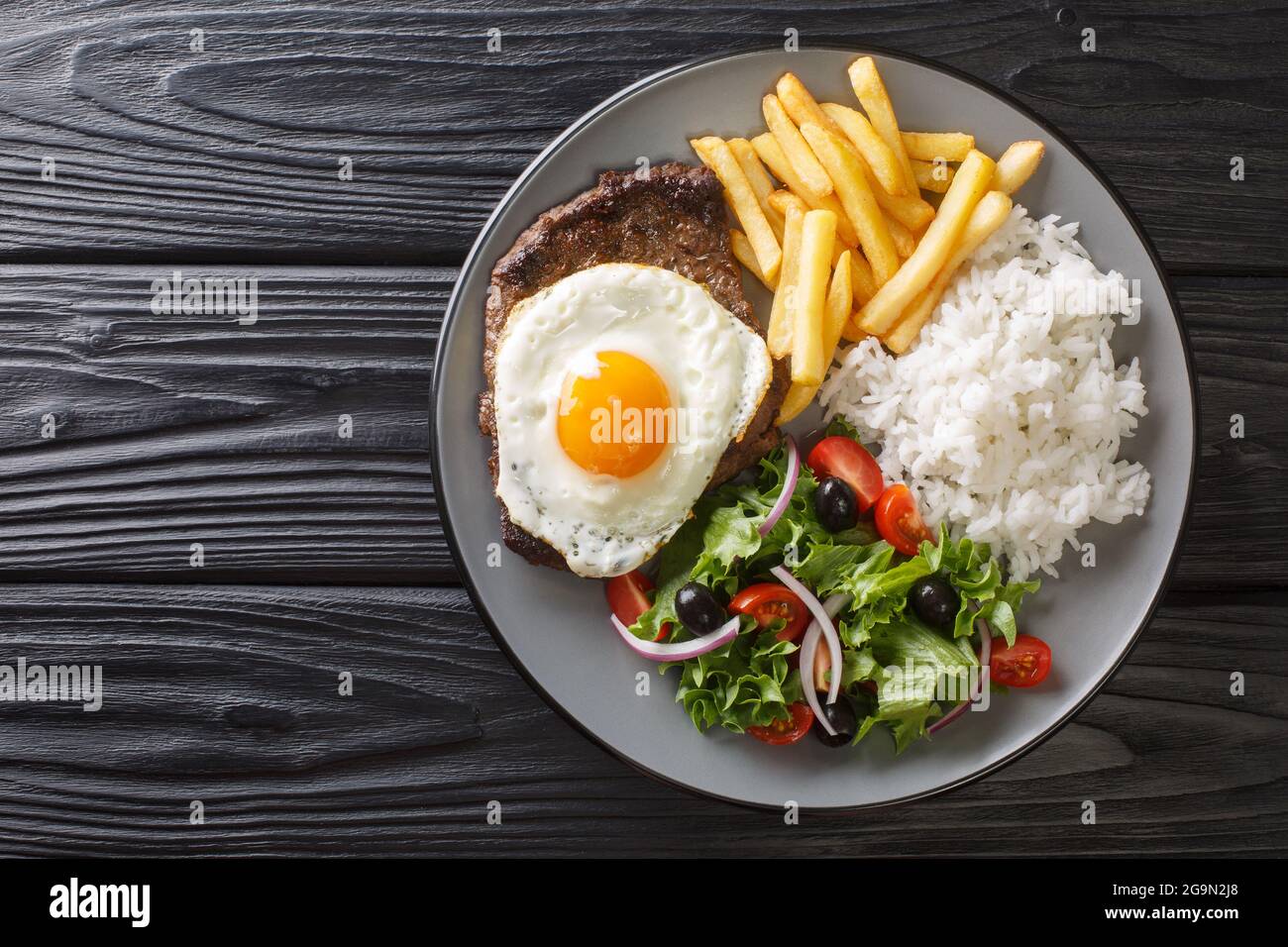 Bitoque Recipe Portuguese Style Steak with Egg, french fries, rice and ...