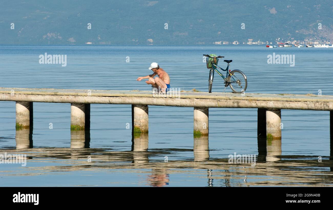 Ohrid, Republic of Macedonia - July 17, 2011: a fisherman without a ...