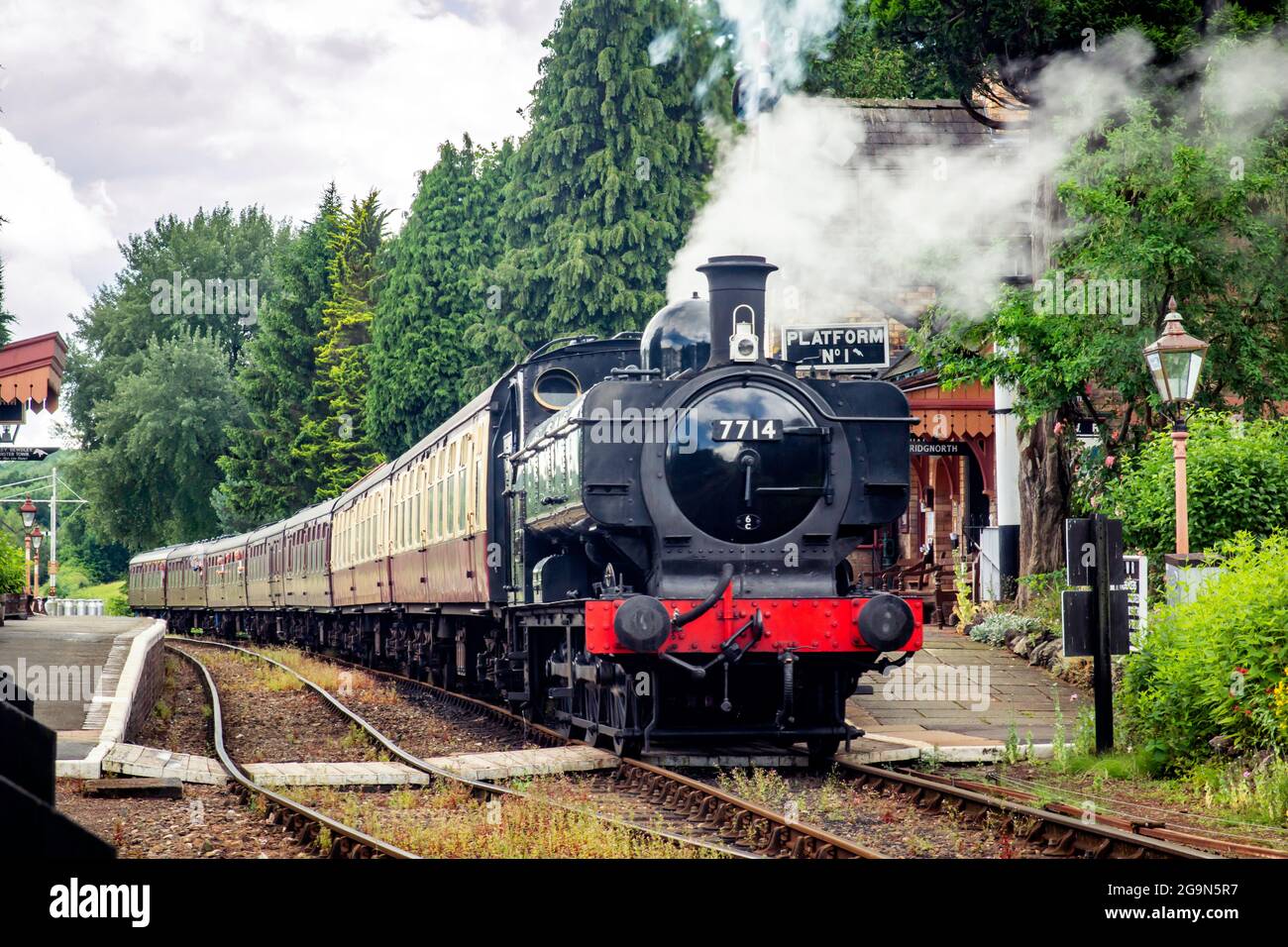 GWR Pannier tank locomotive 7714 heading a passenger train on the ...