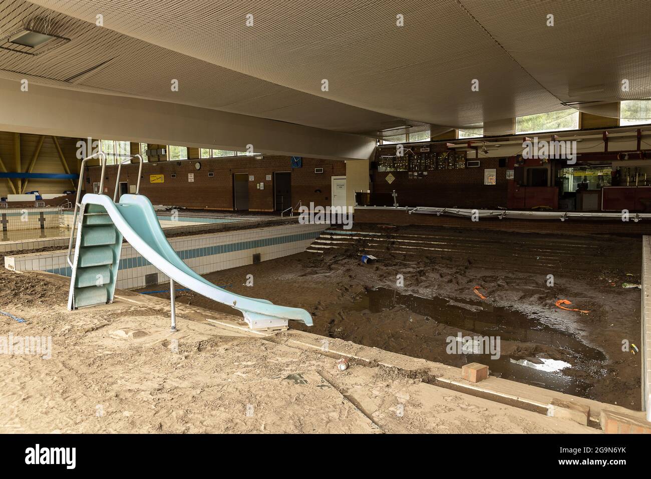 Illustration shows mud everywhere, inside the public swimming pool in ...
