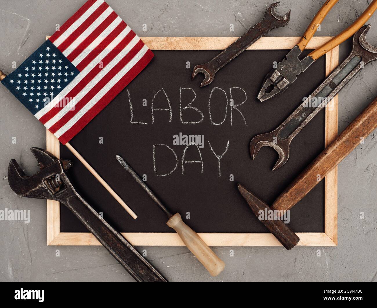 LABOR DAY. Hand tools and the Flag of the United States of America ...