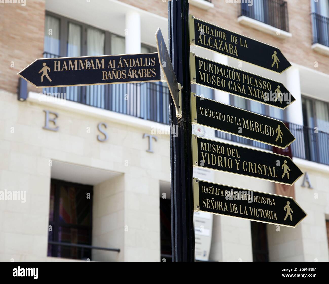 Street signs / Street sign in Malaga.Museo Picasso,Alcazaba,Hammam al ...