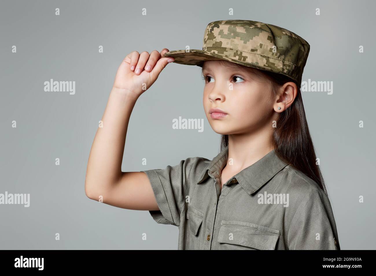child girl wear military uniform. kid dressed like a soldier Stock ...