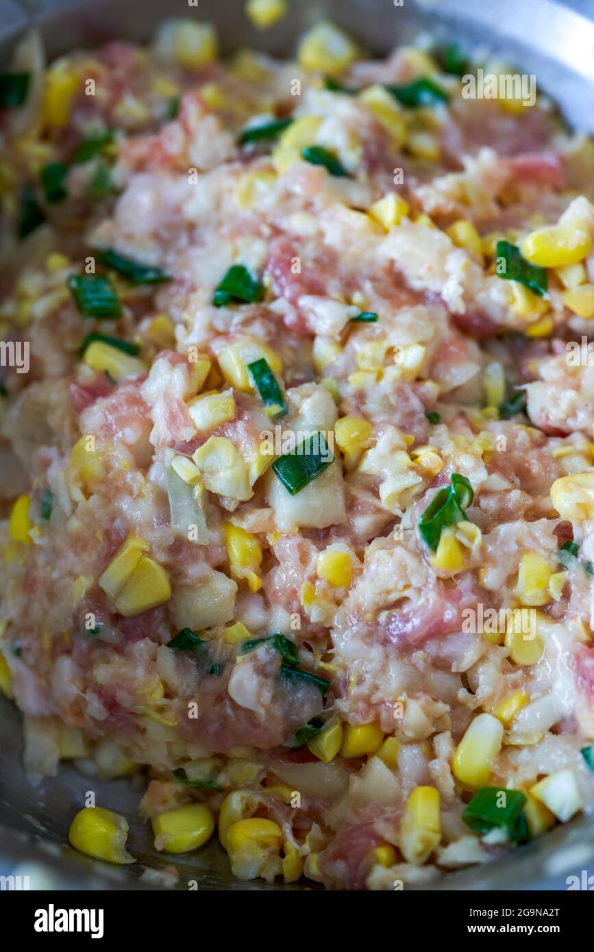 Chinese traditional dumpling stuffing, corn pork stuffing Stock Photo ...