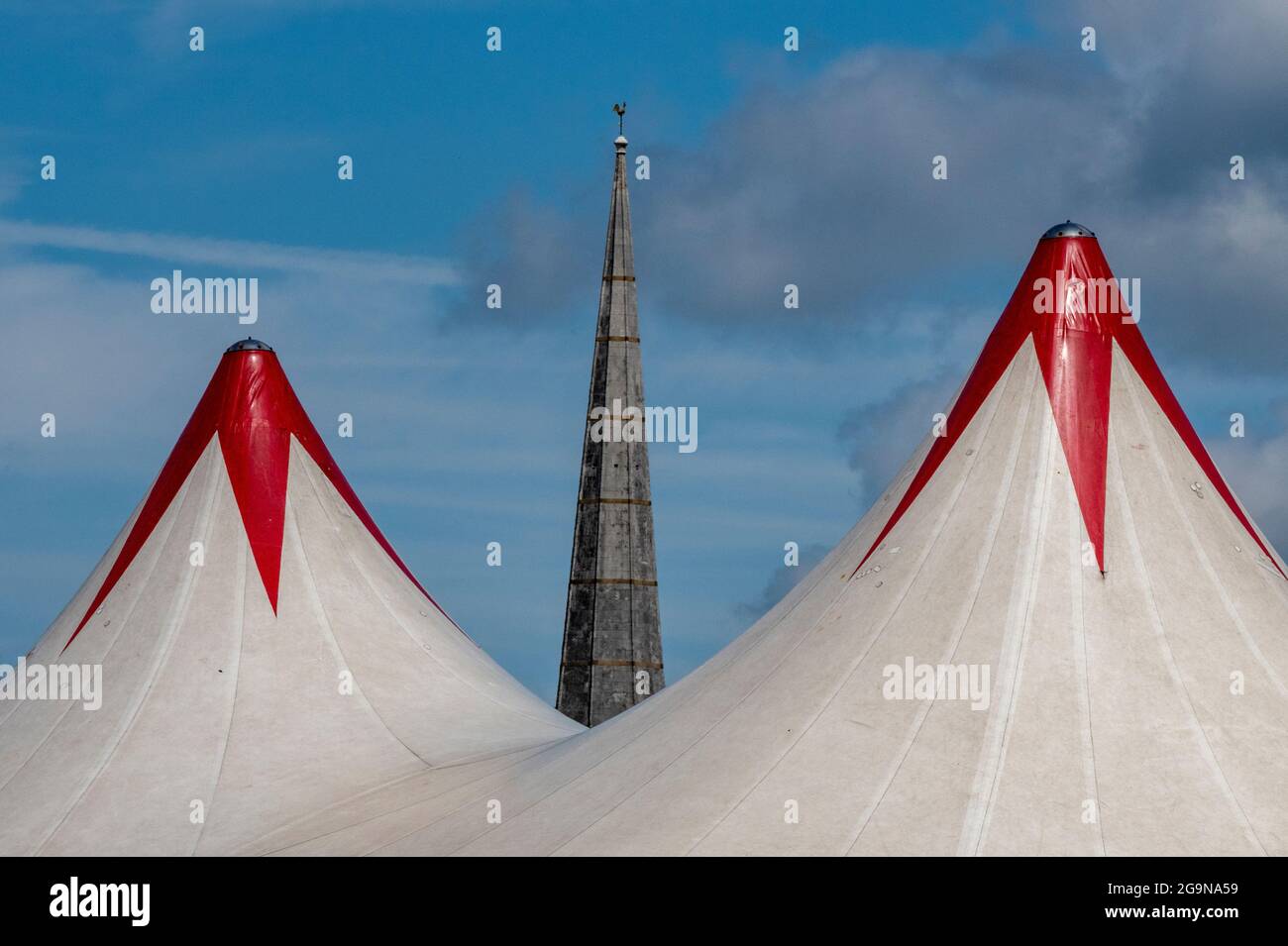 church spire or steeple rising between the twin pinnacles of a large ...
