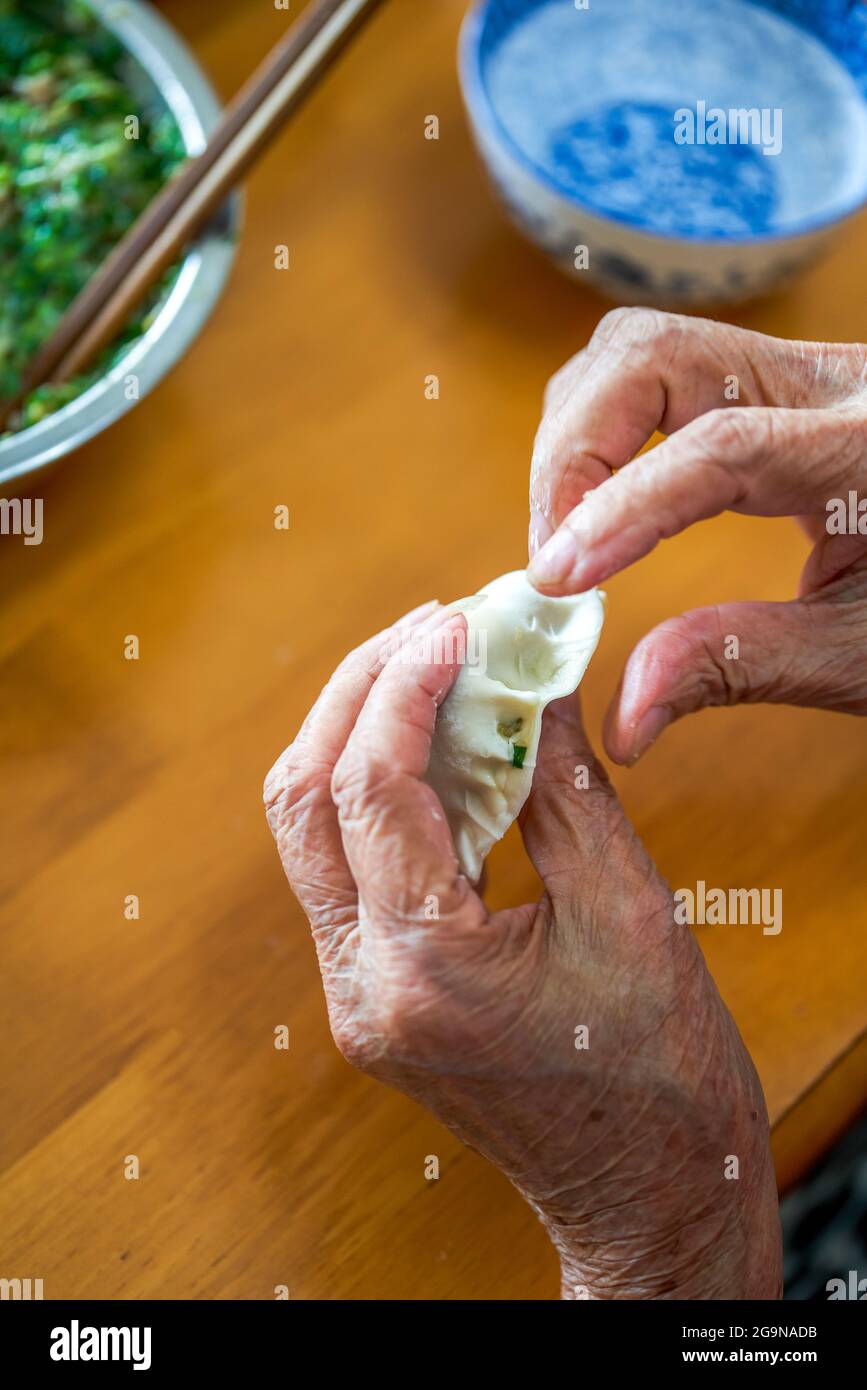 Chinese family dumpling hi-res stock photography and images - Alamy