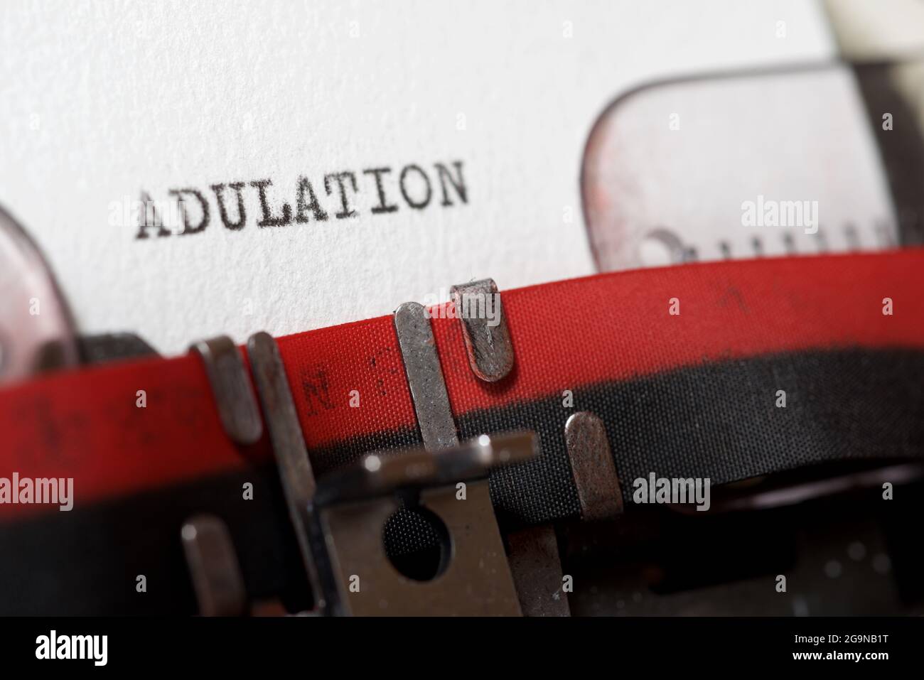 The word adulation written with a typewriter Stock Photo - Alamy