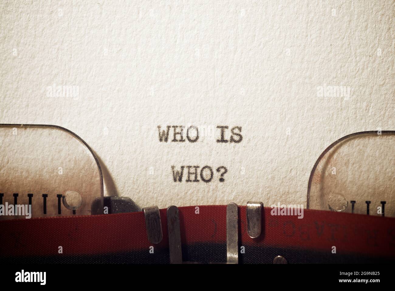 Who is who question written with a typewriter Stock Photo - Alamy