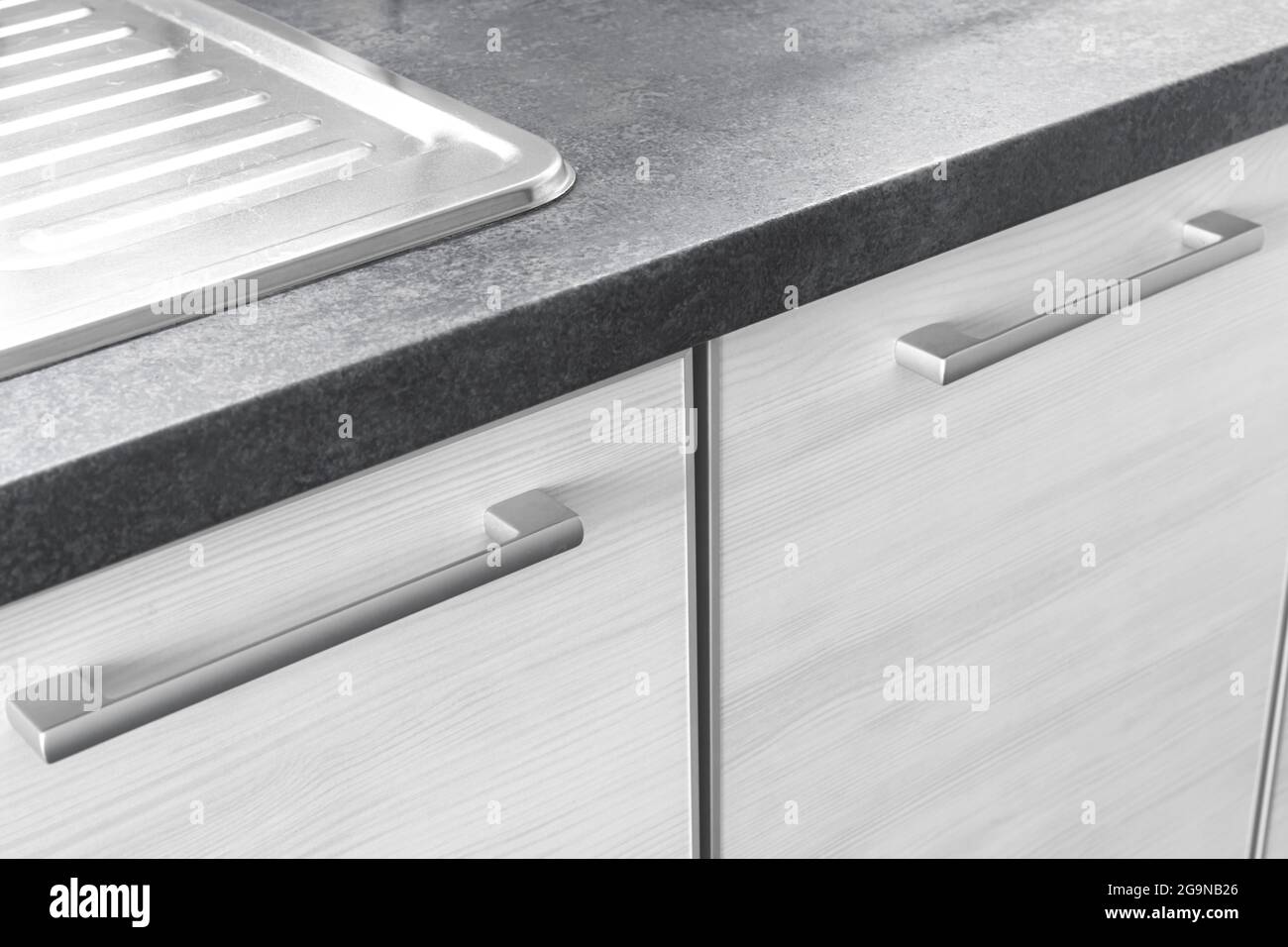 Modern kitchen interior design with drawer and table top, kitchen close ...