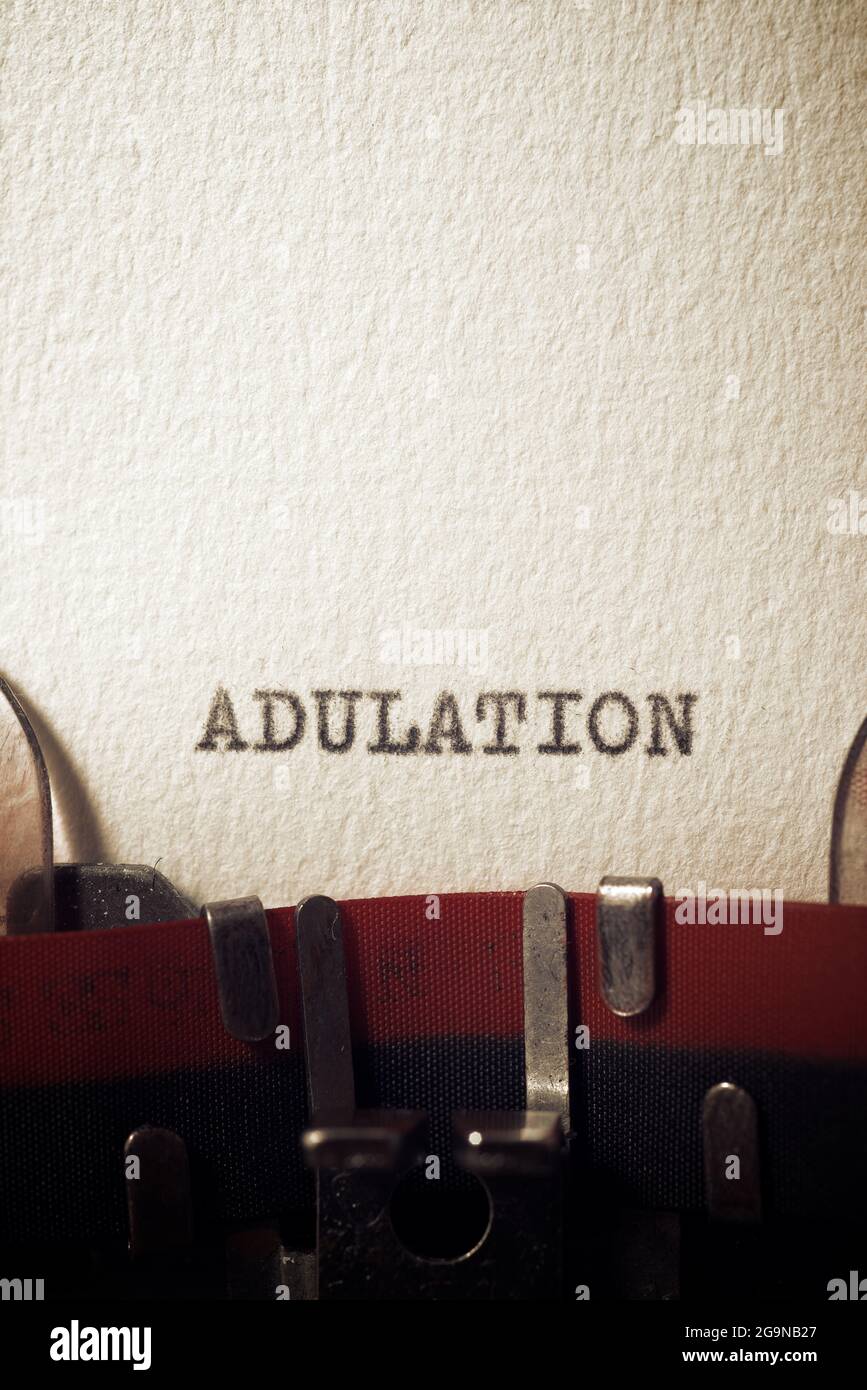 The word adulation written with a typewriter Stock Photo - Alamy