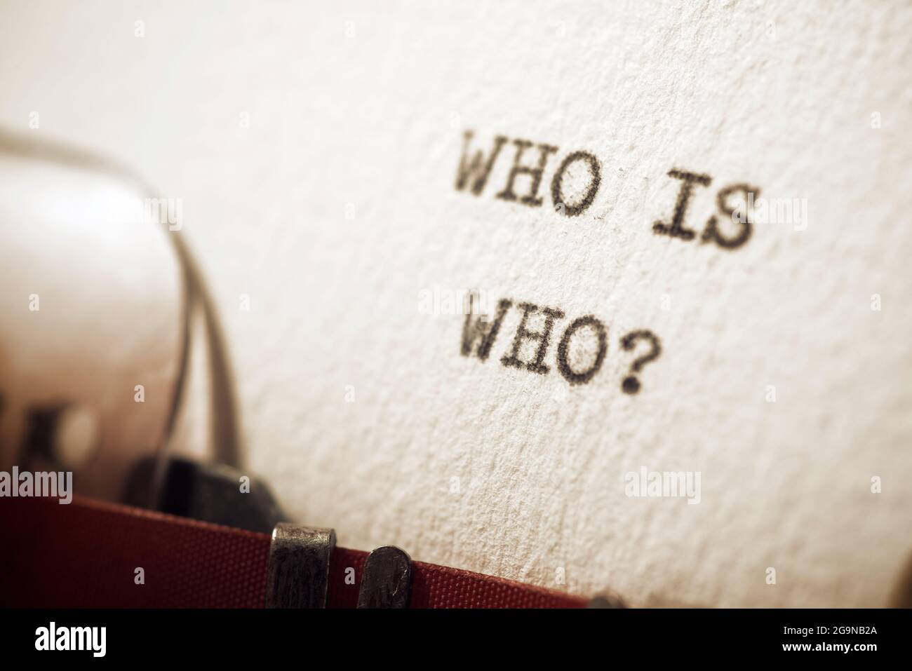 Who is who question written with a typewriter Stock Photo - Alamy