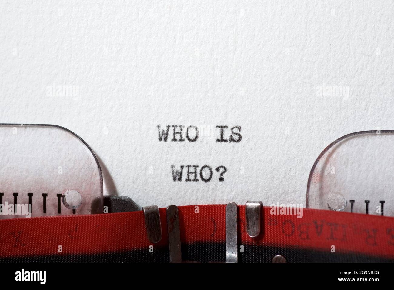 Who is who question written with a typewriter Stock Photo - Alamy