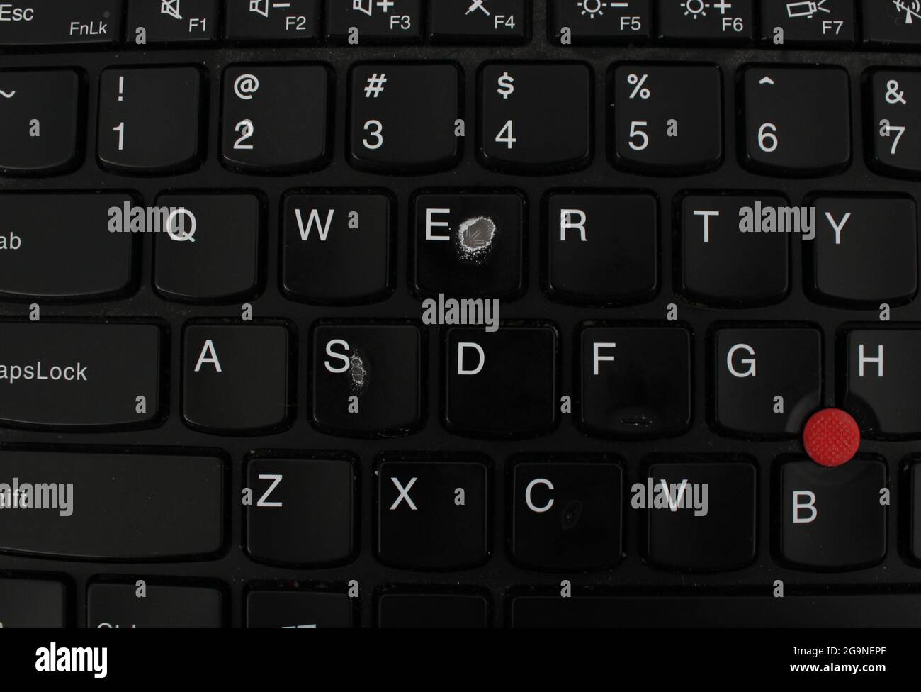 Wear Marks on the E and S keys on an Old Keyboard Stock Photo - Alamy