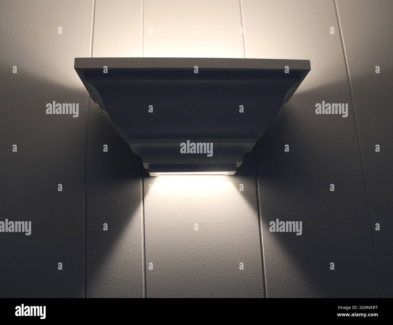 A Simple Wall Sconce Light Fixture Stock Photo - Alamy