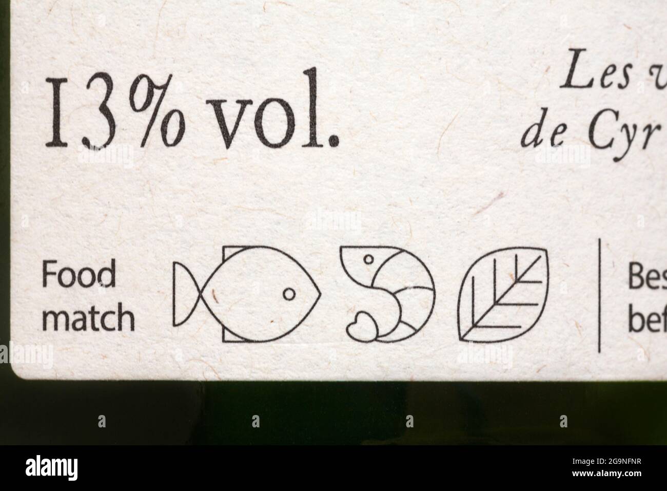 Food match symbols and 13% vol - detail on bottle of wine to match wine ...