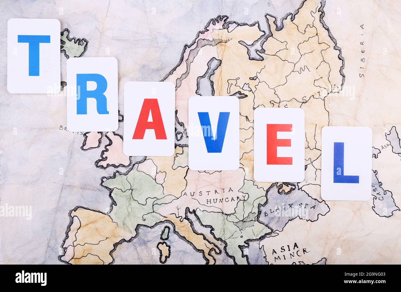 Colorful word Travel on World map background Stock Photo - Alamy