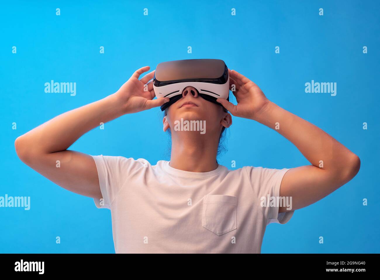 Young man using virtual reality headset. VR gadgets Stock Photo - Alamy