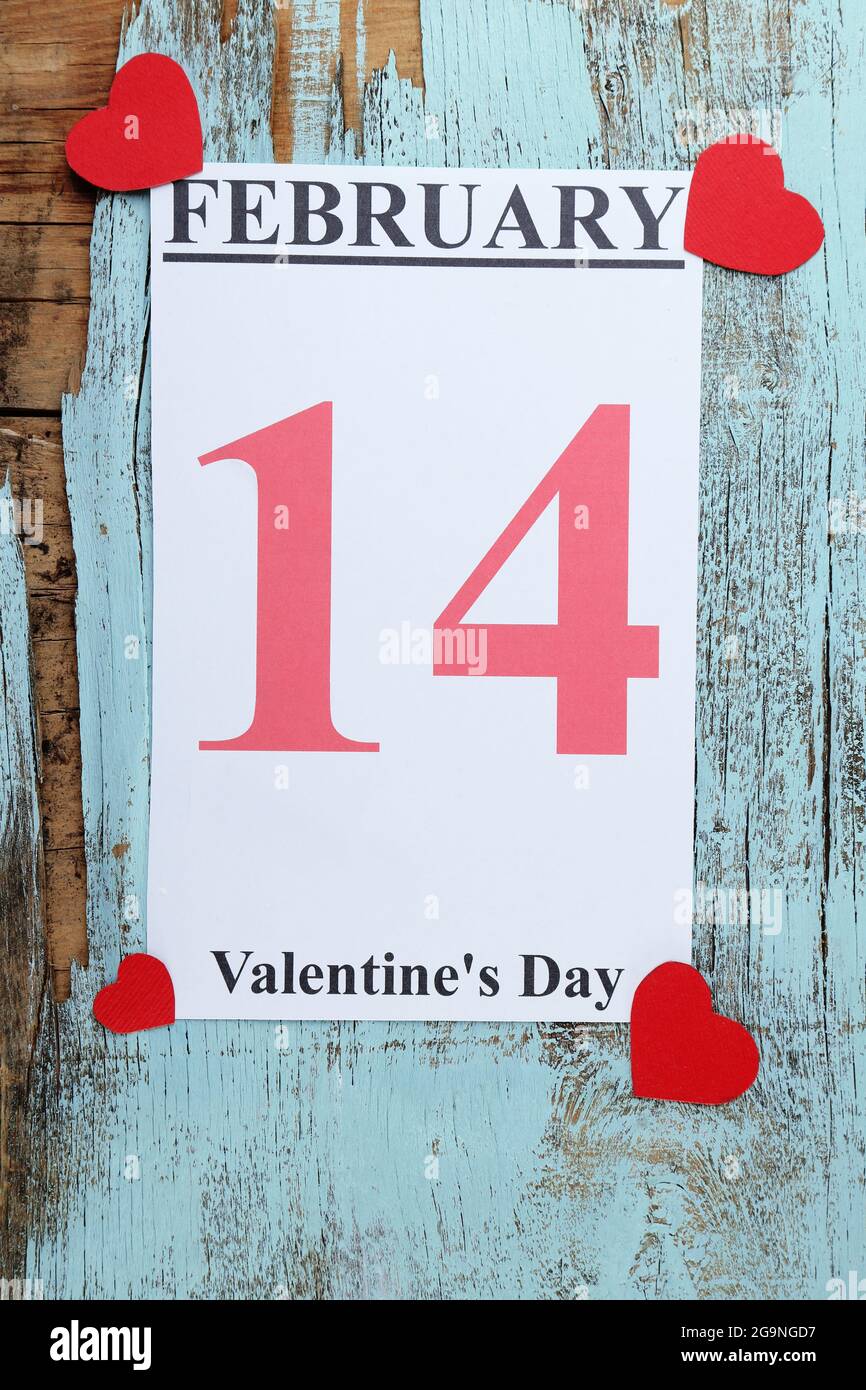Valentines Day, February 14 on calendar on wooden background Stock ...