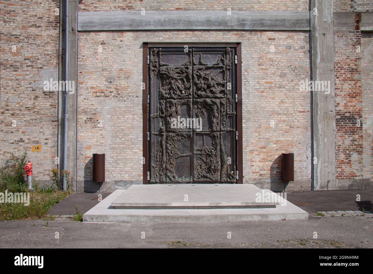 Elaborate iron entrance door to Alchemist - one of the best restaurants ...