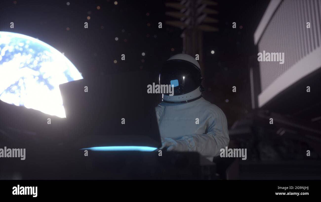 Astronaut works on his science laptop in a space colony on the moon. 3d ...