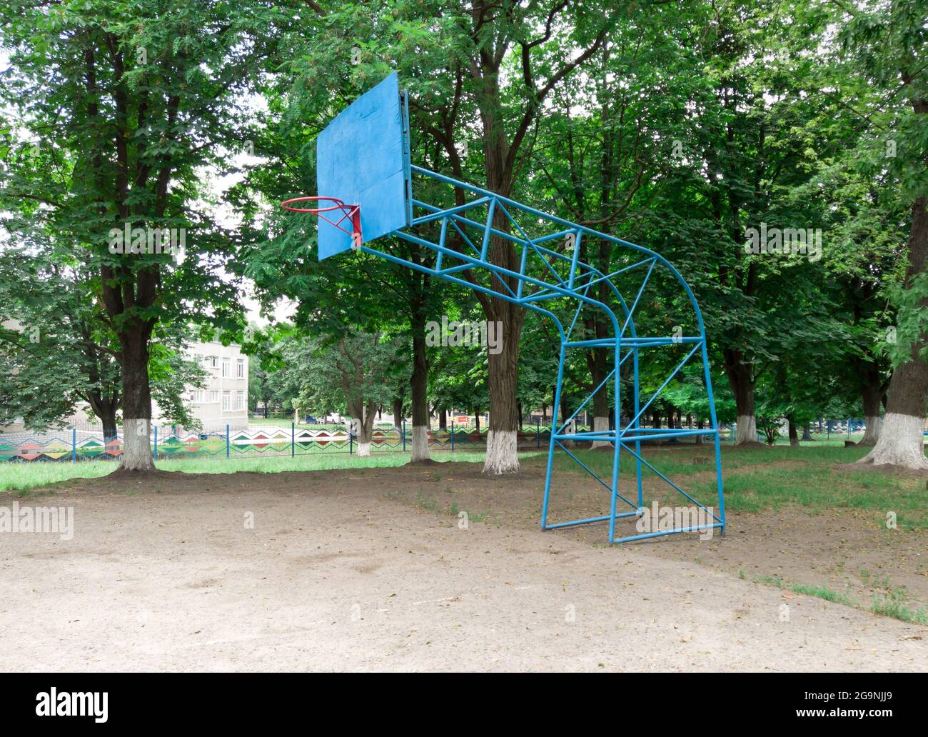 Old basketball board in a school court yard. basketball hoop for ...