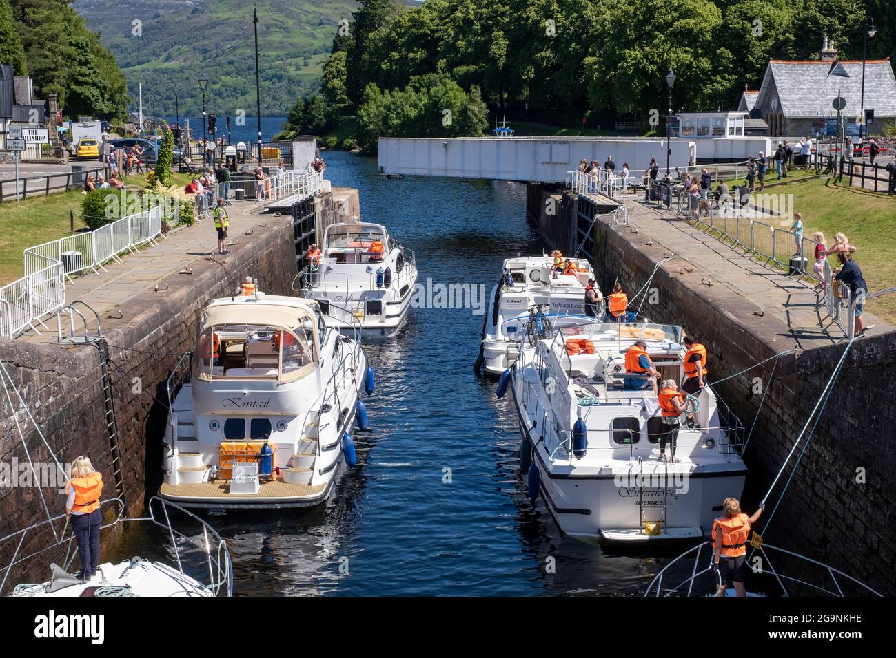 Leisure boats entering Loch Ness through the Caledonian Canal lock ...