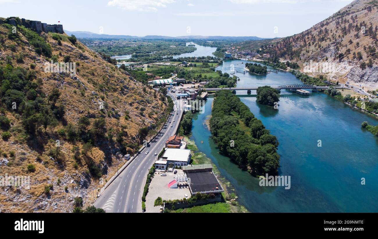 aerial footage of remains of fort, castle, and defense walls in Shkoder ...