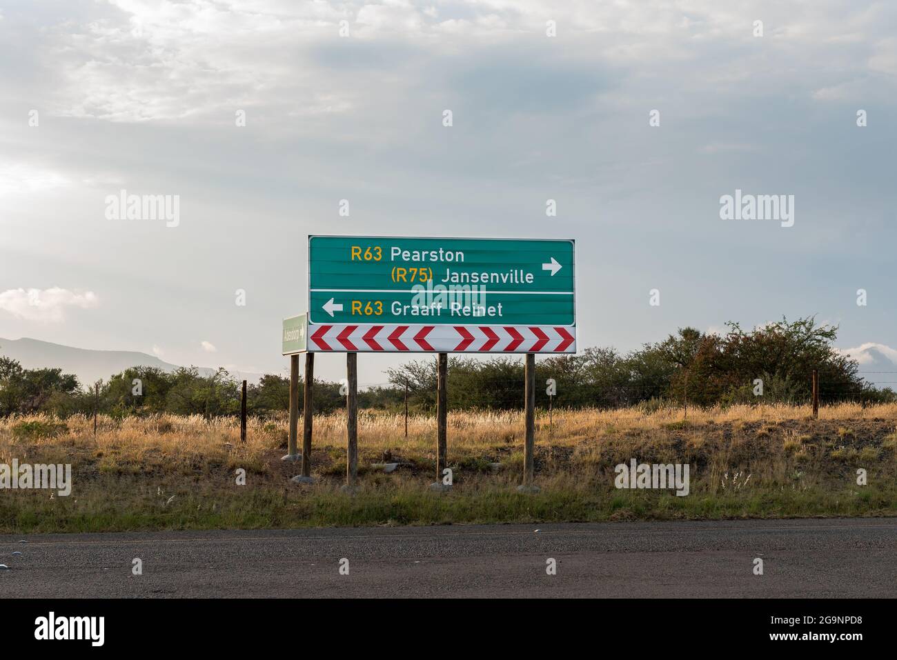 Directional sign at the junction between roads R63 and R75 near Graaff ...