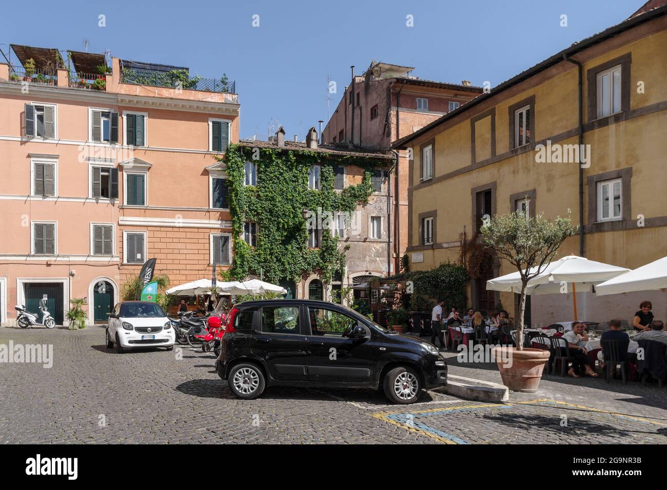 Ancient street with cobblestone in Trastevere district (Rione ...
