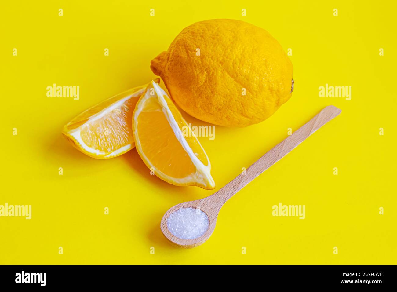 Citric acid on a yellow background. Selective focus.nature Stock Photo ...