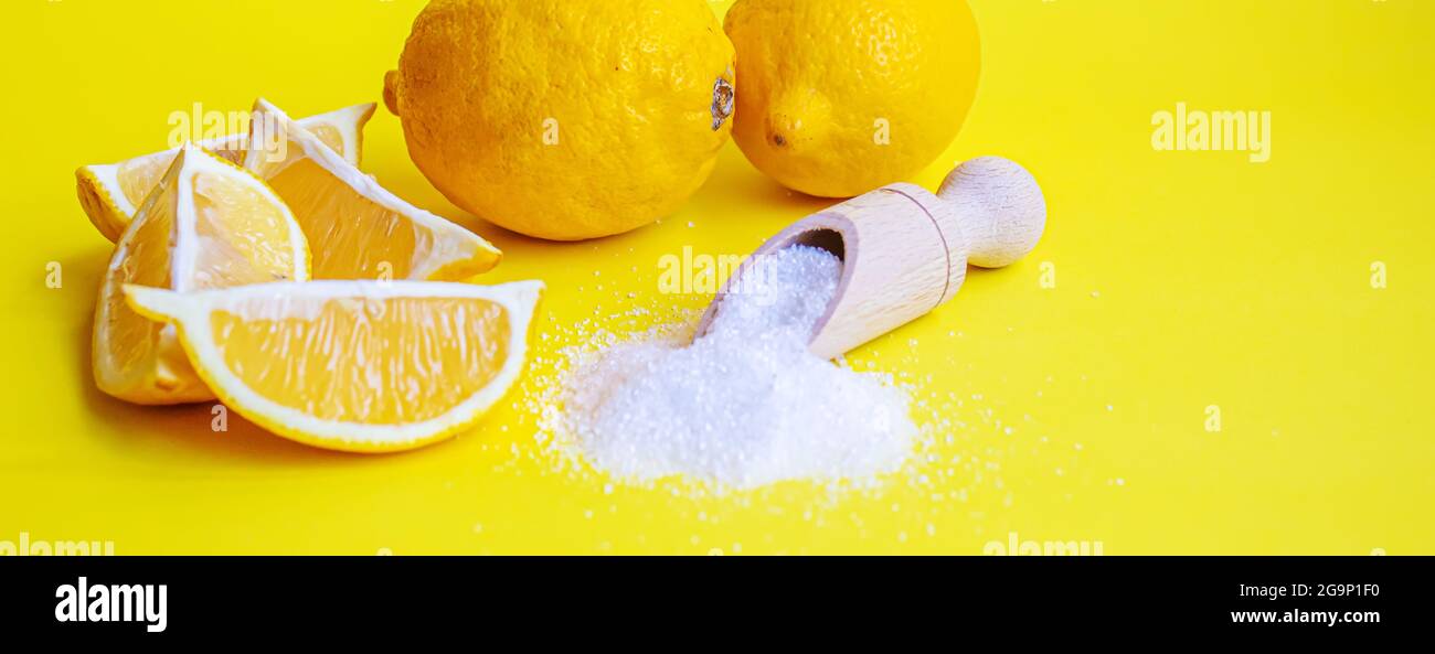 Citric acid on a yellow background. Selective focus.nature Stock Photo ...