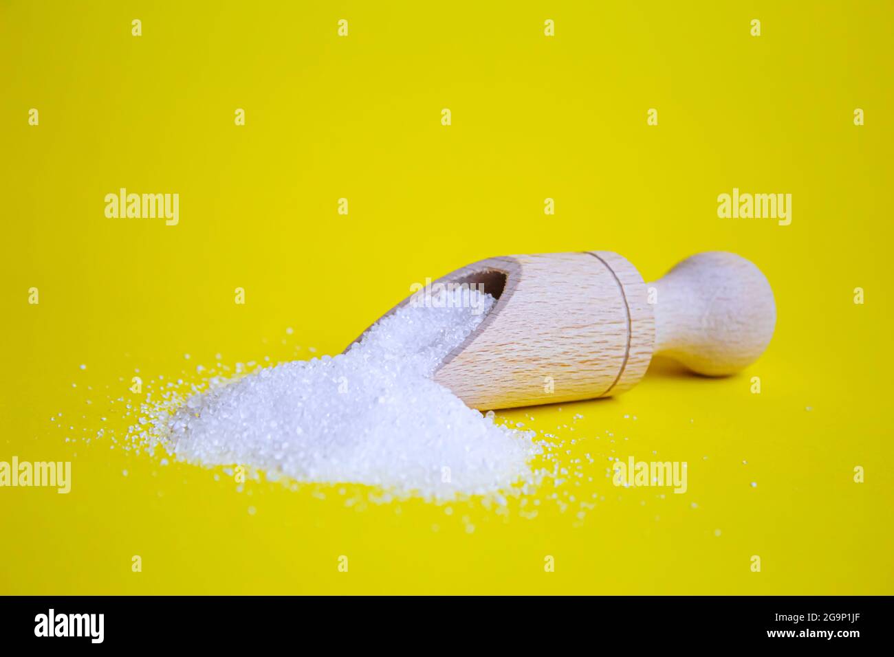 Citric acid on a yellow background. Selective focus.nature Stock Photo ...