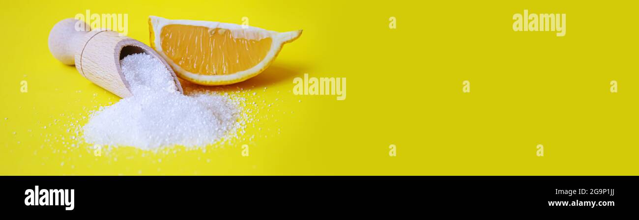 Citric acid on a yellow background. Selective focus.nature Stock Photo ...