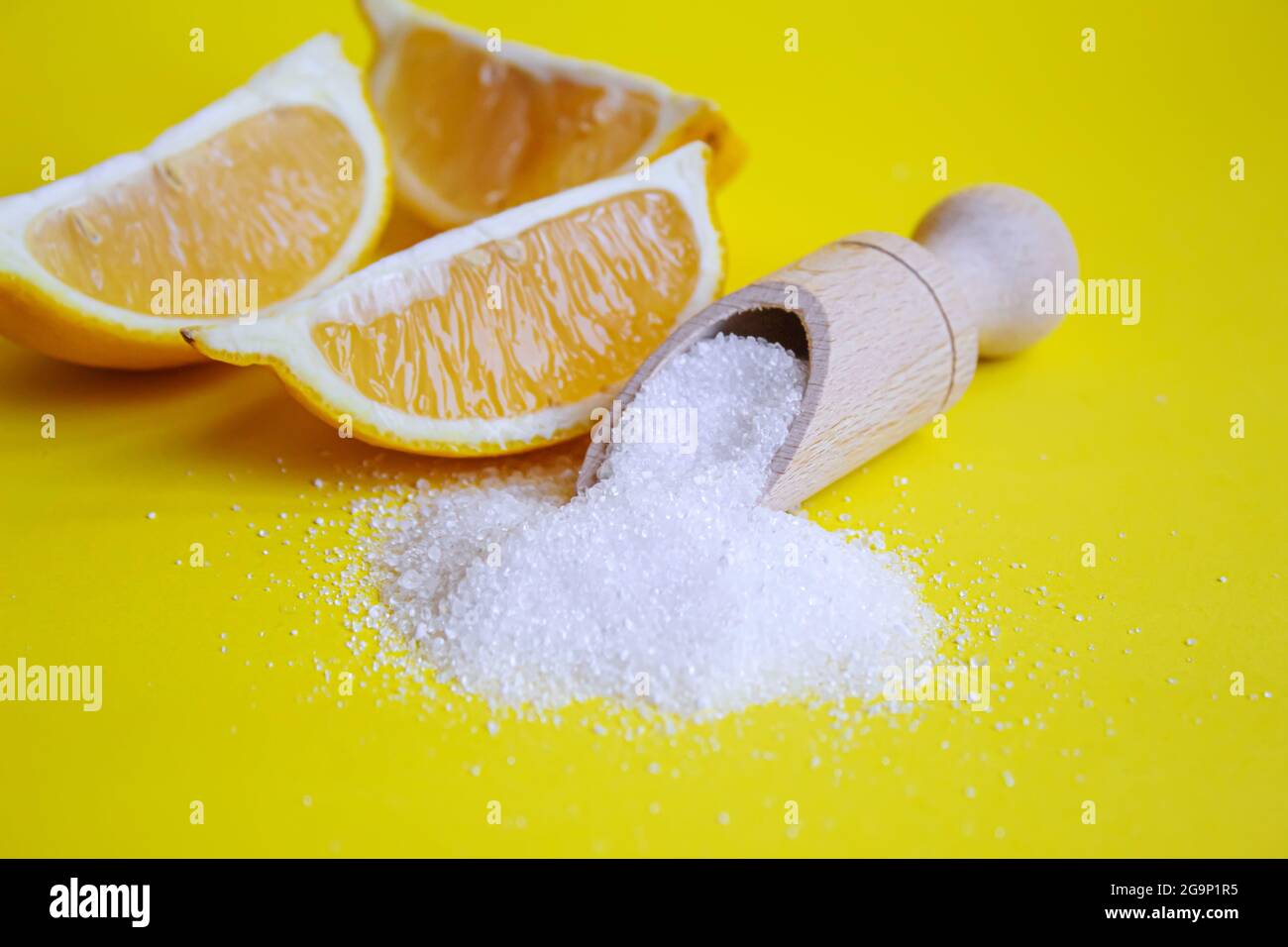 Citric acid on a yellow background. Selective focus.nature Stock Photo ...