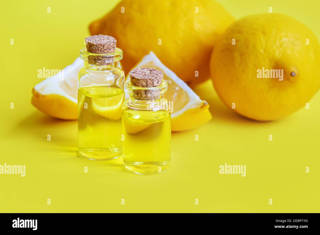lemon essential oil on a yellow background. Selective focus.nature ...