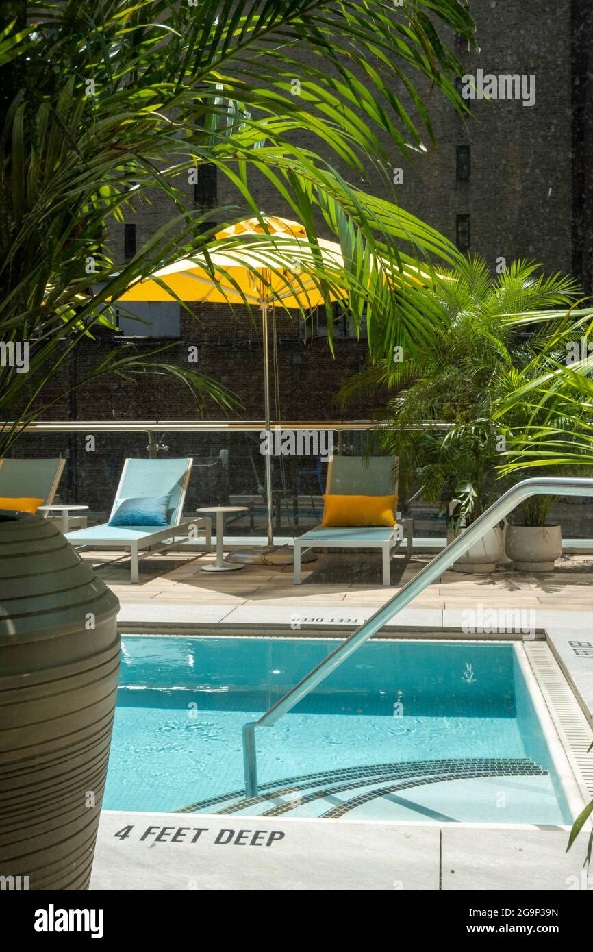 Margaritaville Resort Times Square features a swimming pool at the ...