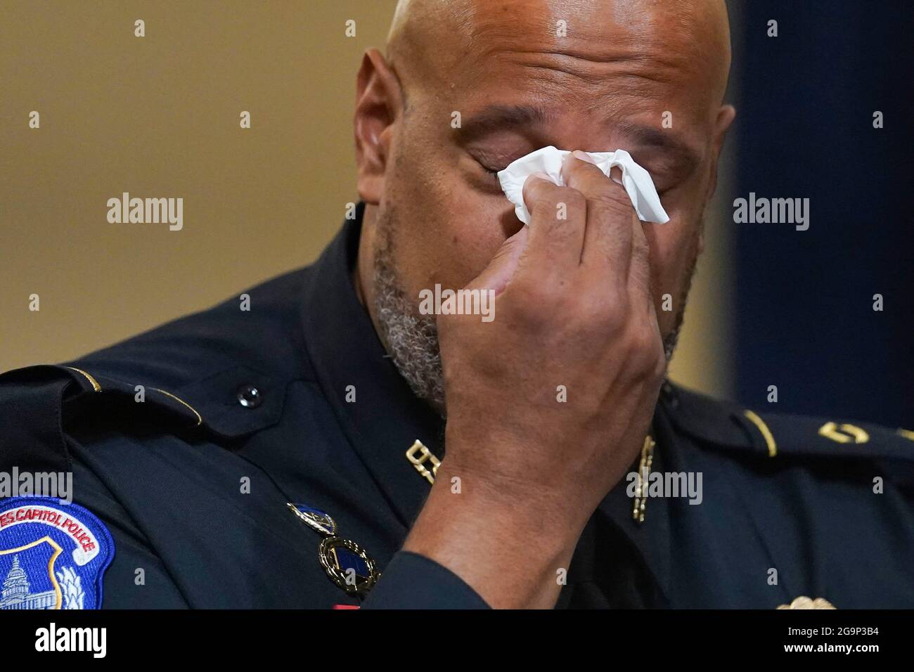 Washington Metropolitan Police Department officer Daniel Hodges wipes ...