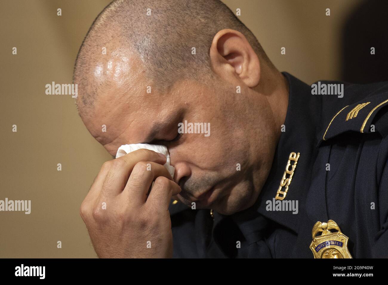 Washington Metropolitan Police Department officer Daniel Hodges listens ...