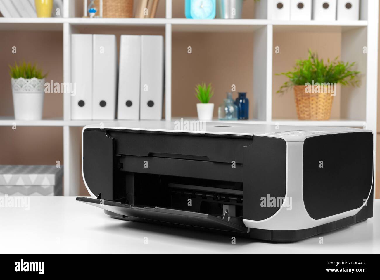 Printer, copier, scanner in office. Workplace Stock Photo - Alamy